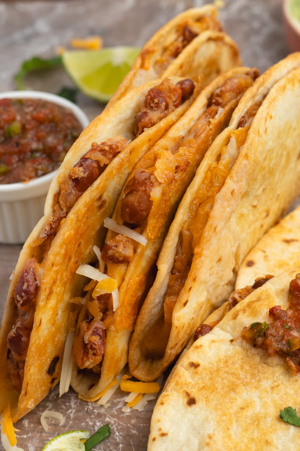 Baked Crispy Bean and Cheese Tacos with Avocado Crema - Sprinkled With ...